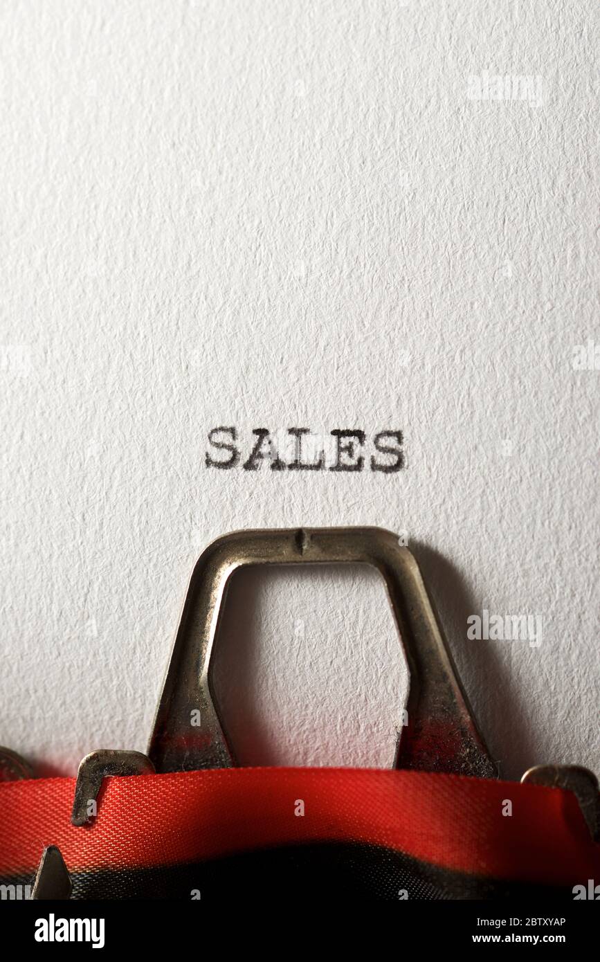 The word Sales written with a typewriter Stock Photo - Alamy