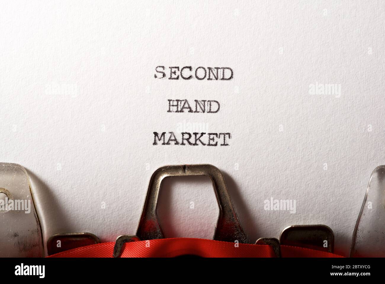 Second hand market written with a typewriter Stock Photo - Alamy