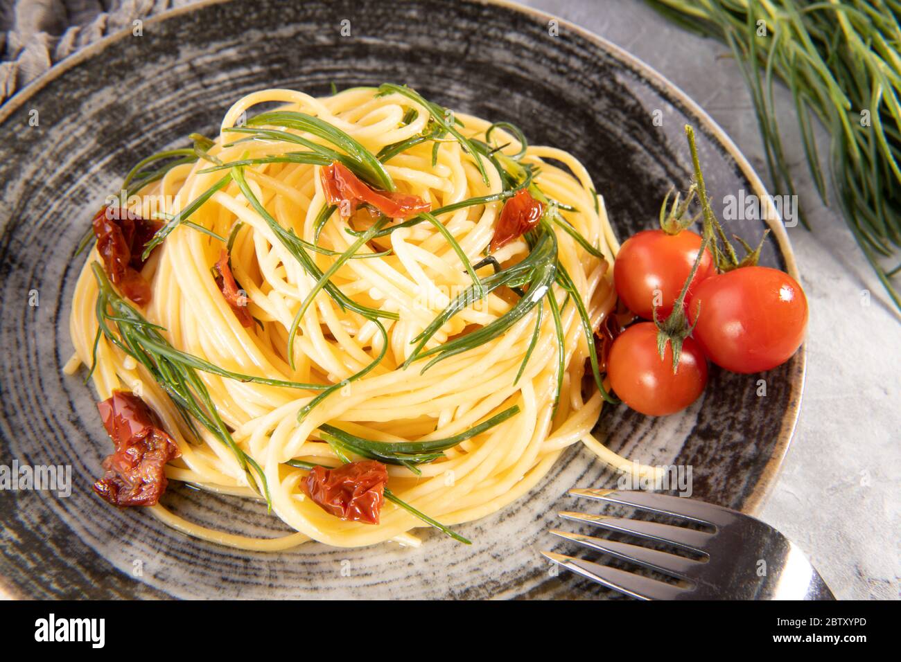 Spaghetti with agretti, a spring vegetable from Italy, and sun dried ...