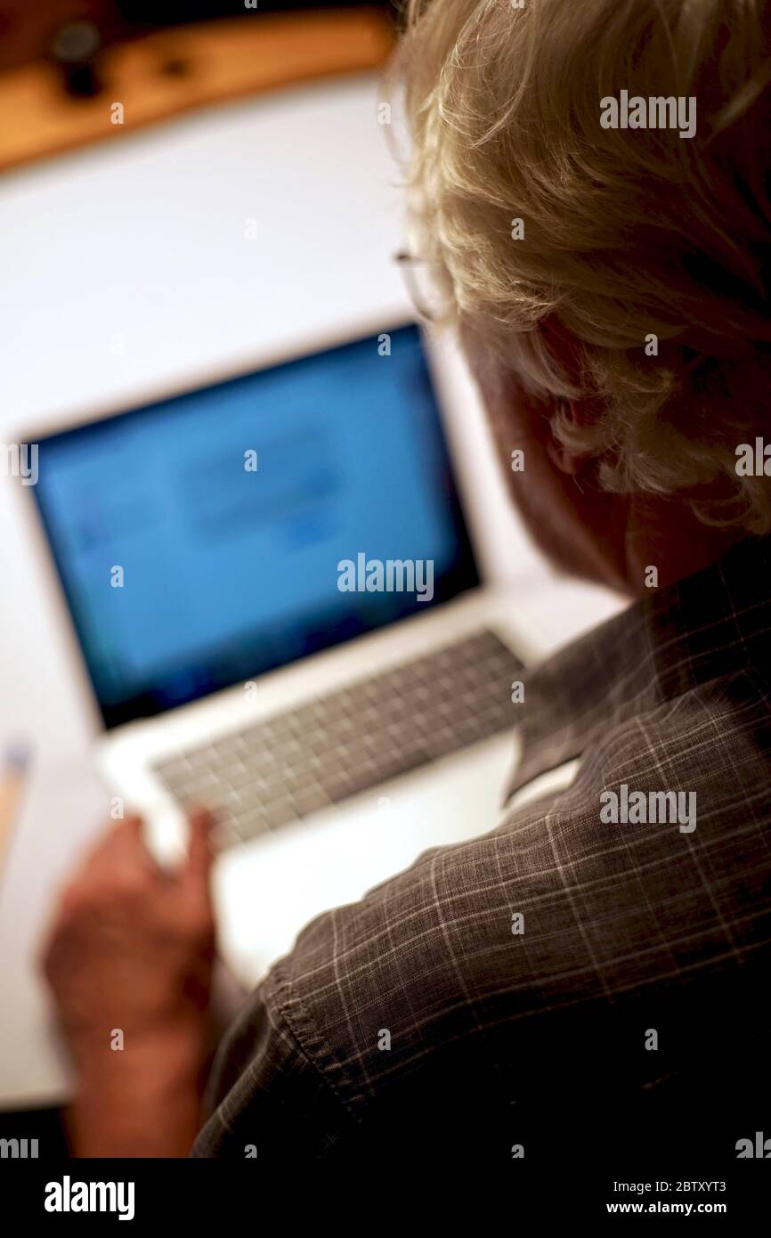 Old man computer back view hi-res stock photography and images - Alamy