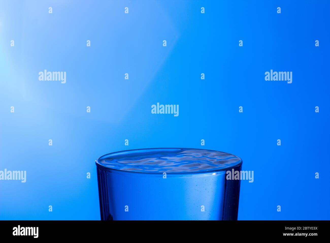 Clear, drinking water falls into a clear glass, healthy, wholesome ...