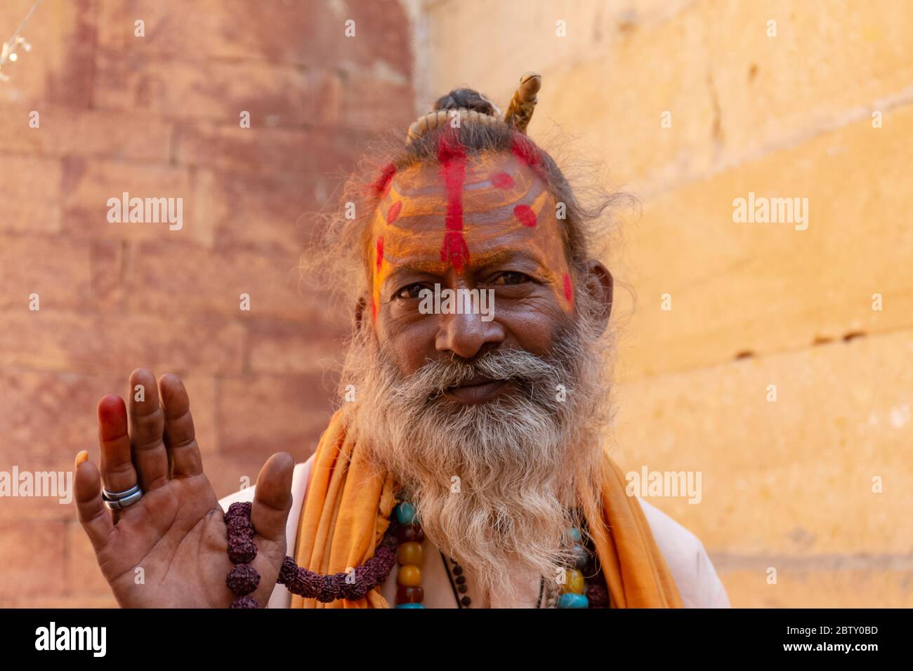 Portrait of Sadhu Baba (Monk) in traditional saffron clothes and beard ...