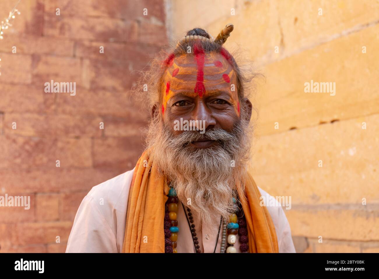 Portrait of Sadhu Baba (Monk) in traditional saffron clothes and beard ...