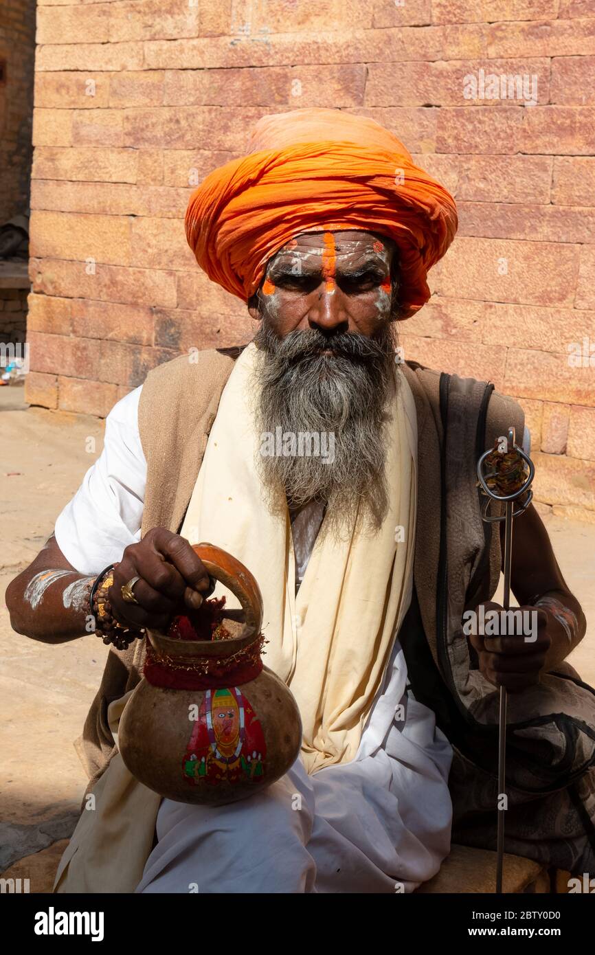 Portrait of Sadhu Baba (Monk) in traditional saffron clothes and beard ...