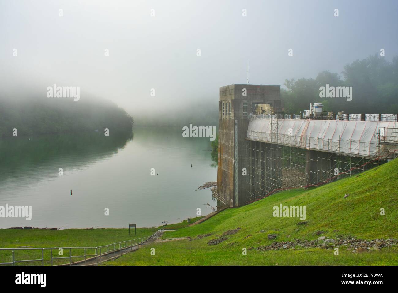 Foggy morning at a river dam Stock Photo - Alamy