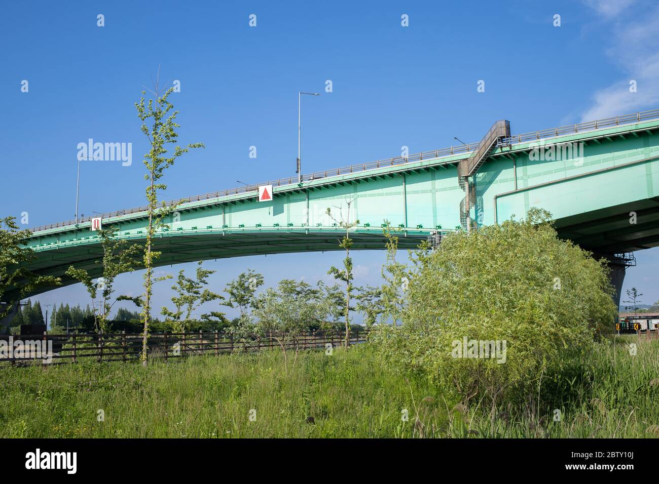 a sturdy-looking bridge made of concrete and steel Stock Photo - Alamy
