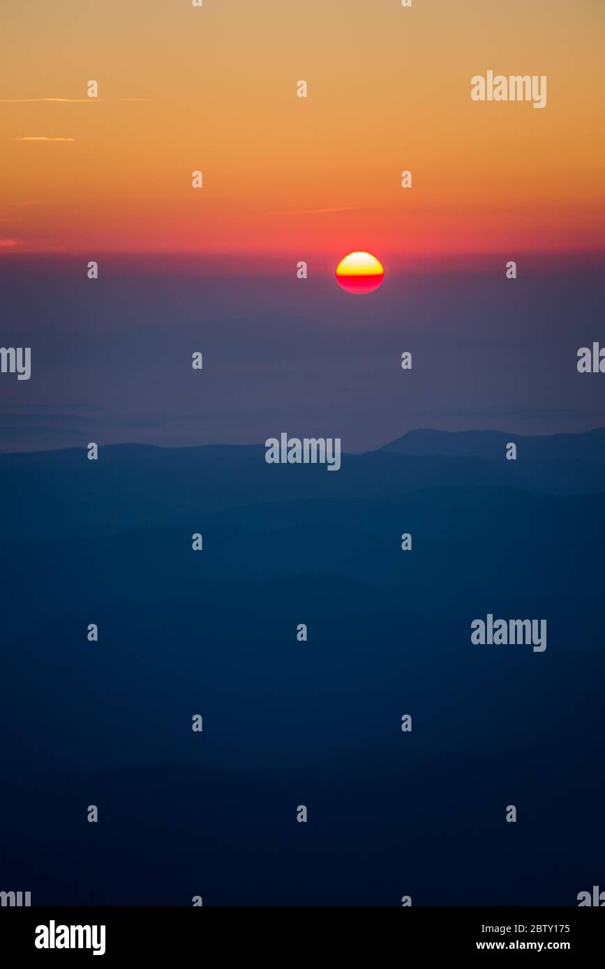 Beautiful sunrise over the mountains, long distance Stock Photo - Alamy
