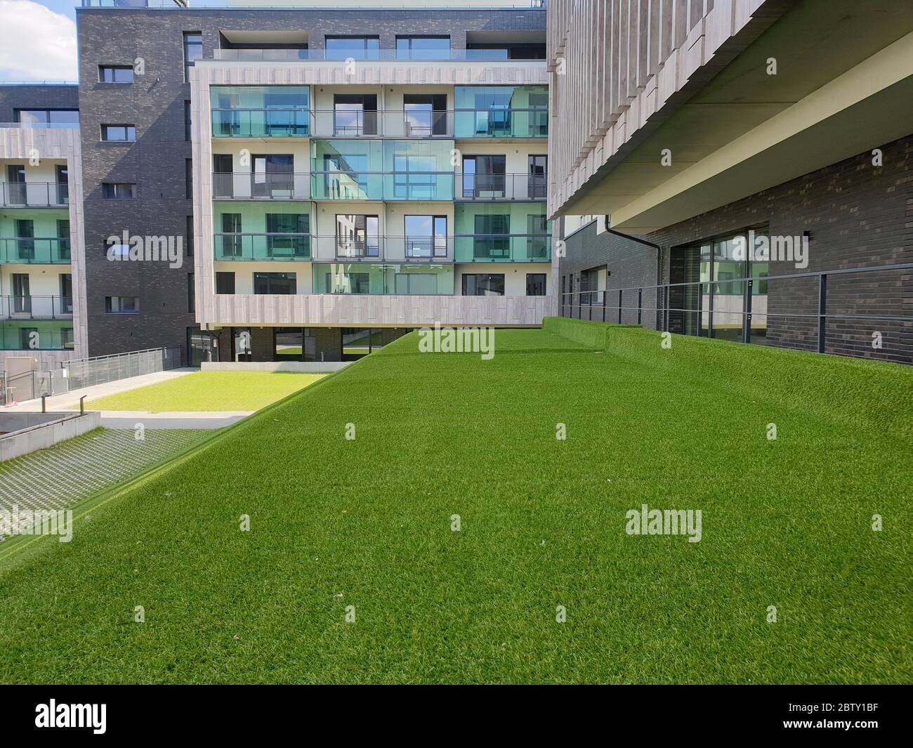 Inner yard of modern building complex Stock Photo - Alamy