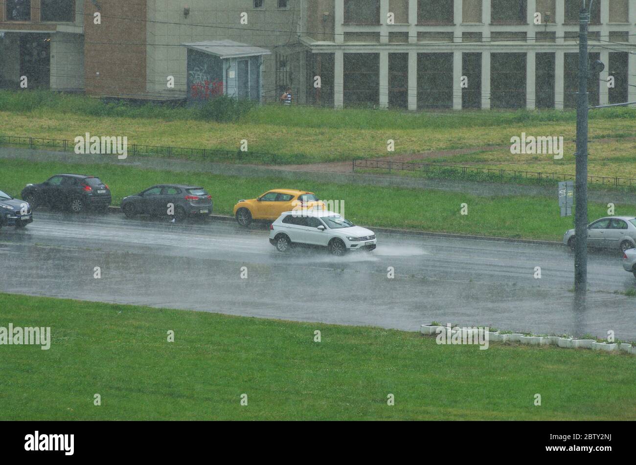 Wet side road hi-res stock photography and images - Alamy