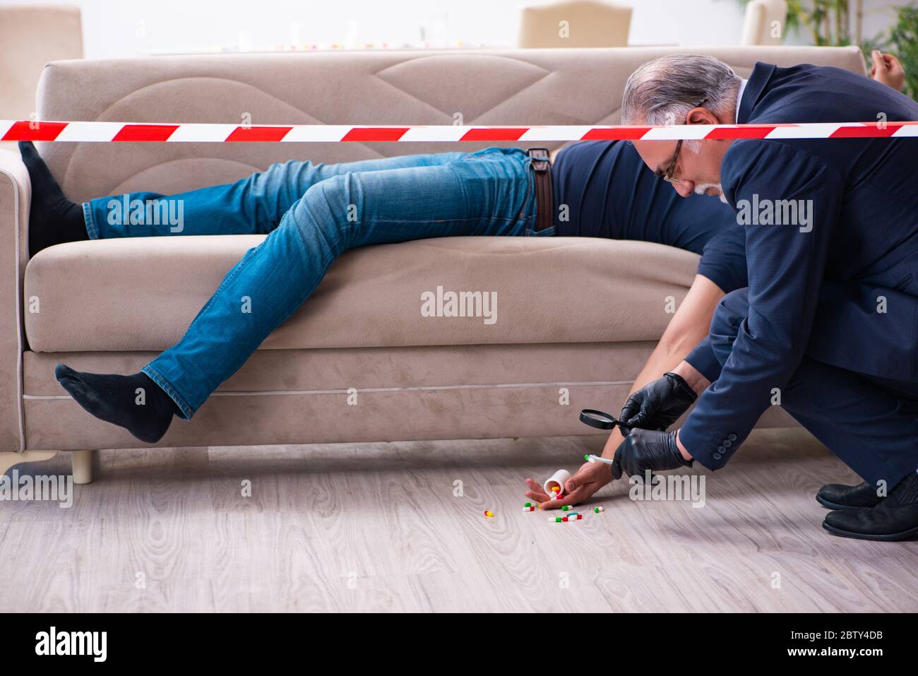 Old male forensic expert at the crime scene Stock Photo - Alamy