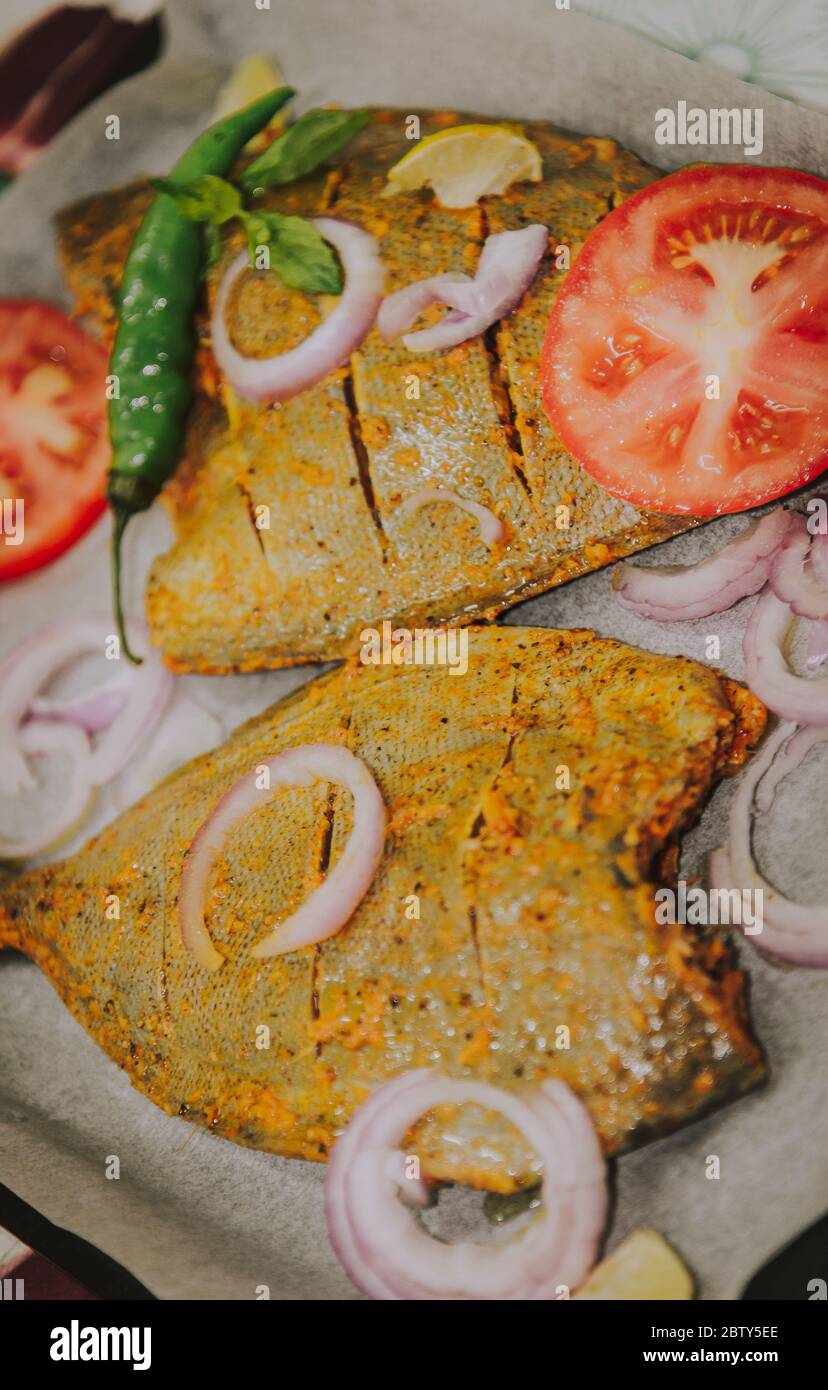 Black Pomfret with indian masala ready grill Stock Photo - Alamy
