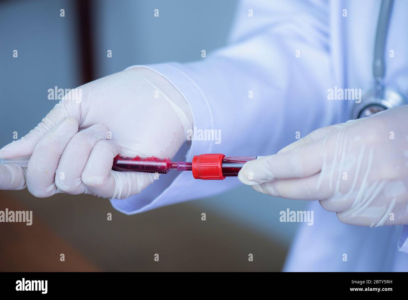 Demonstration of a blood test tool in a vacuum glass tube To find the ...