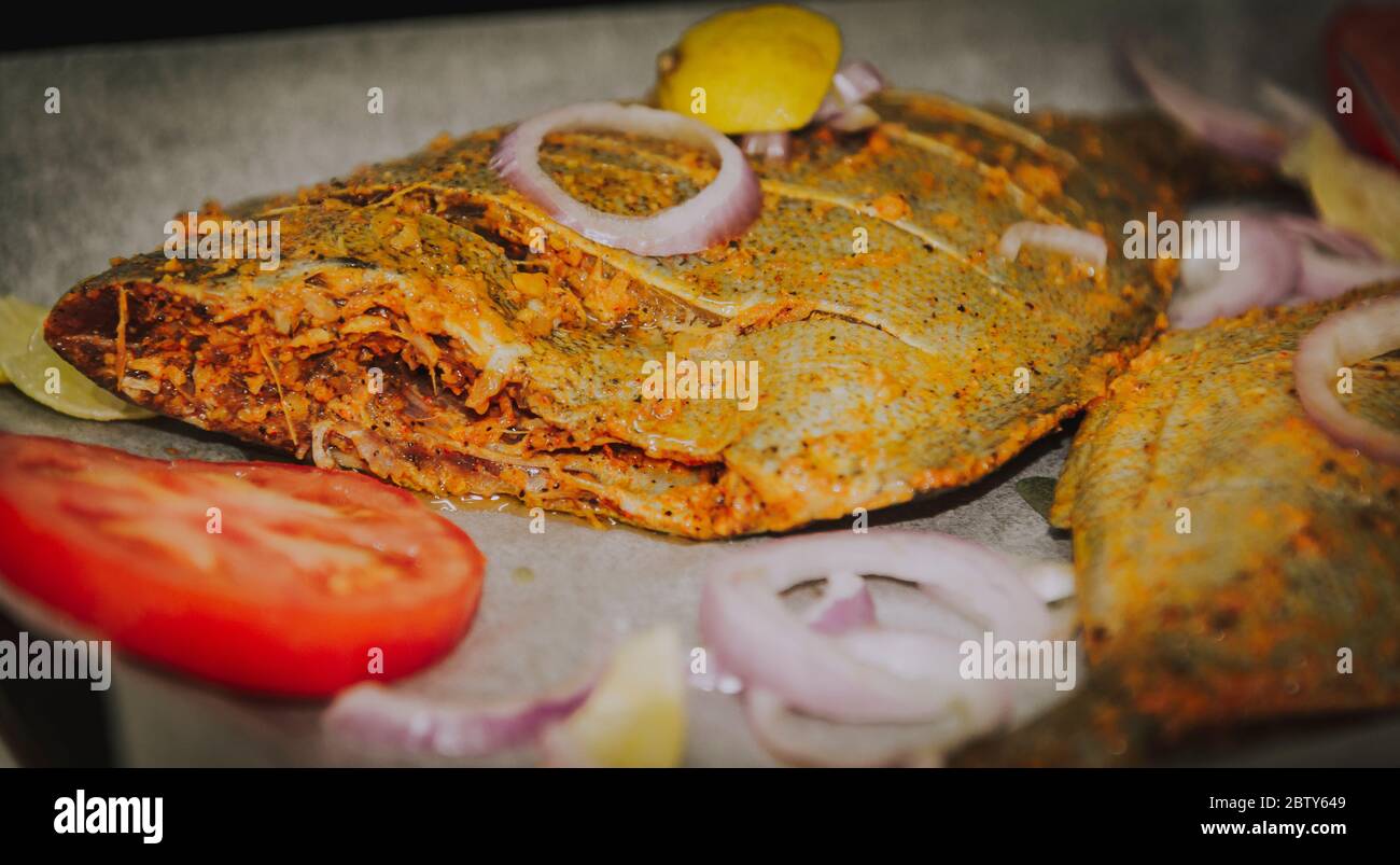 Black Pomfret with indian masala ready grill Stock Photo - Alamy