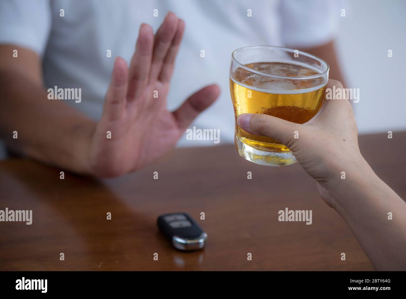 Don't drink drive and Man refusing alcohol beer showing car key as ...