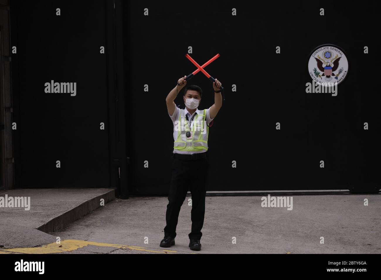 Hong Kong China 28th May 2020 Security Guard Displaying A Sign