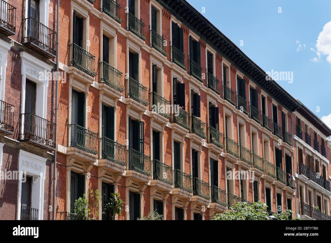 Balconies with wooden shutters spain hi-res stock photography and ...