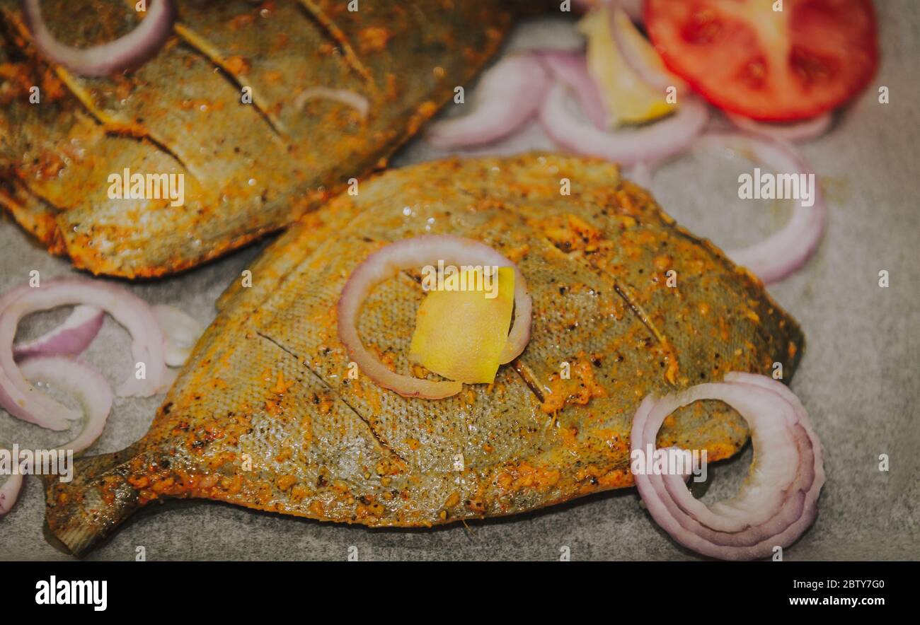 Black Pomfret with indian masala ready grill Stock Photo - Alamy