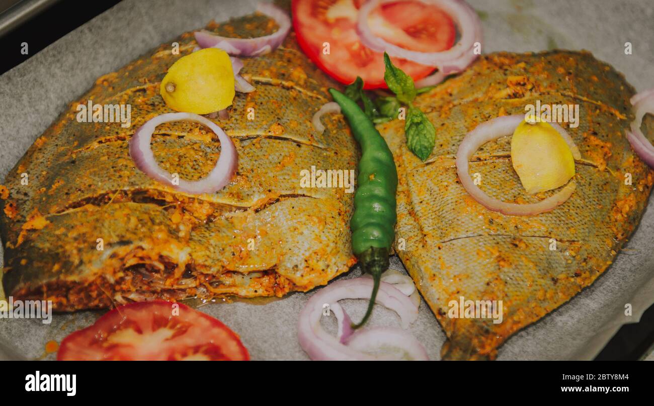 Black Pomfret with indian masala ready grill Stock Photo - Alamy