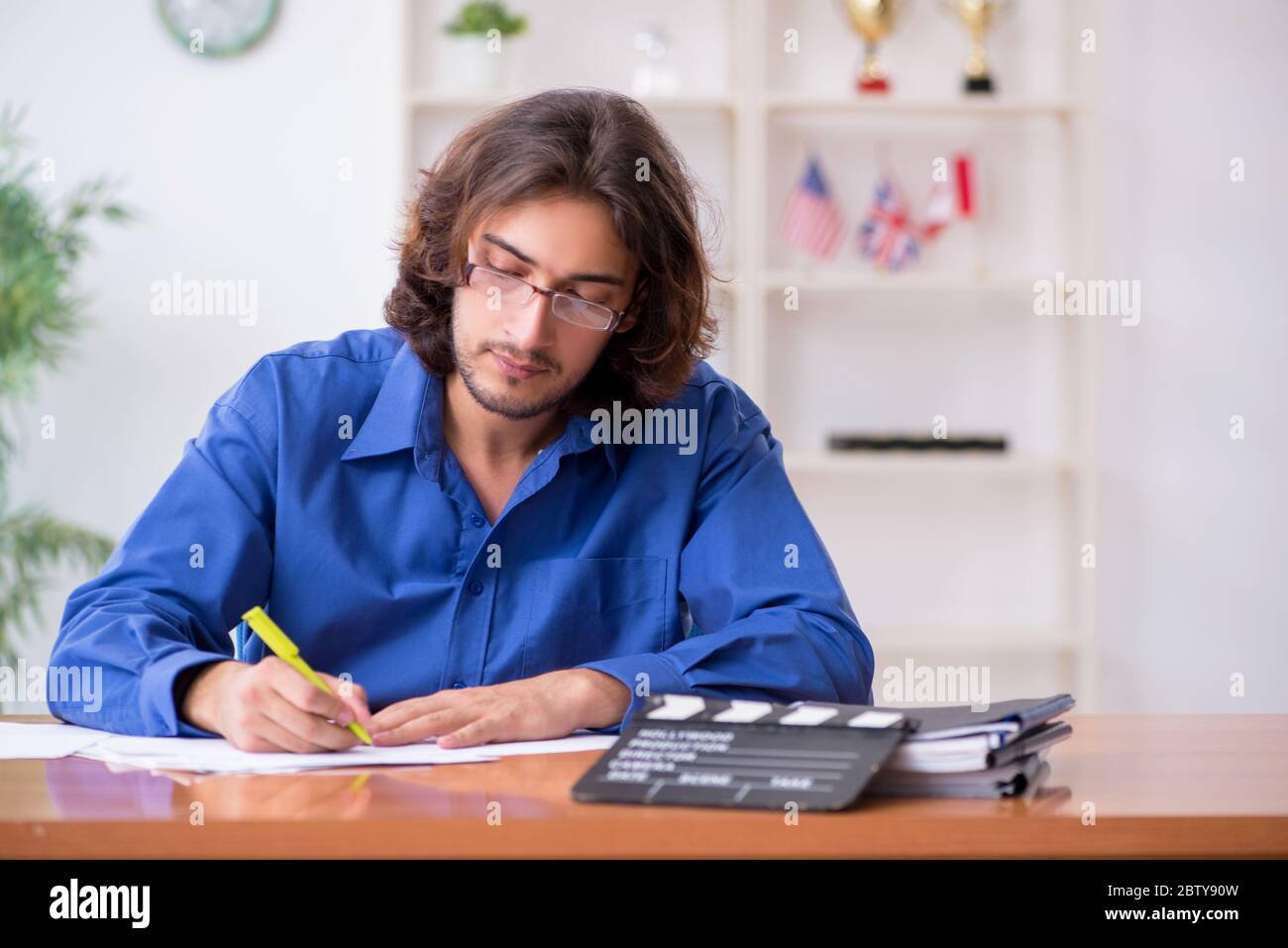 Professional film director script working hi-res stock photography and ...