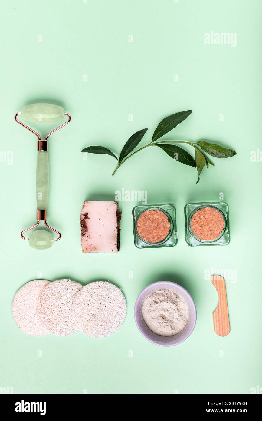 face care tools and accessories.Green spa. massager, facial oil ...
