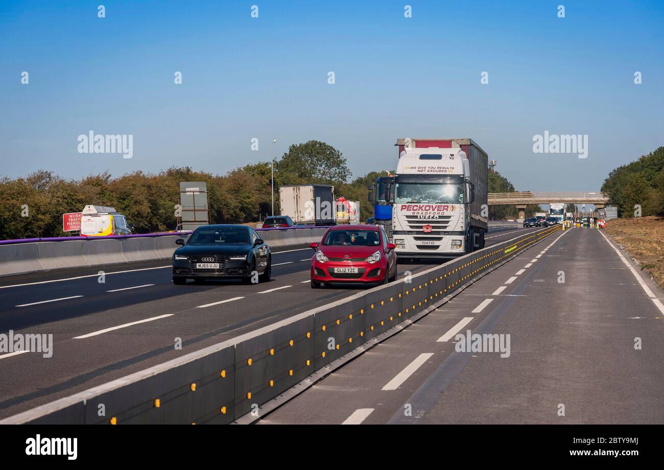Vehicles passing roadworks on the M1 motorway, England Stock Photo - Alamy