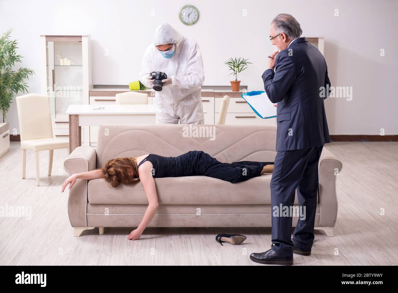 Forensic experts at the crime scene at home Stock Photo - Alamy