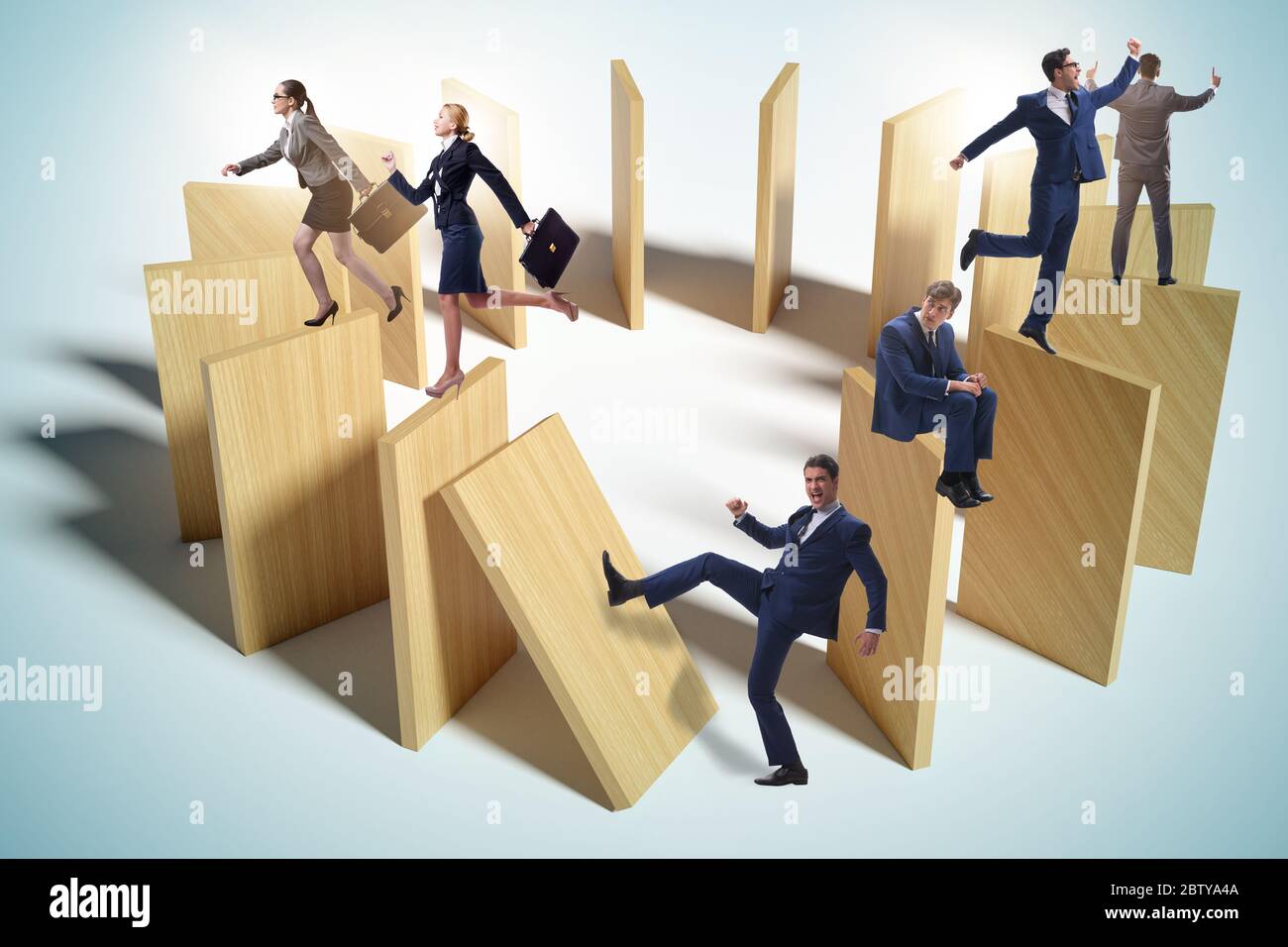 Domino effect and the competition concept Stock Photo - Alamy