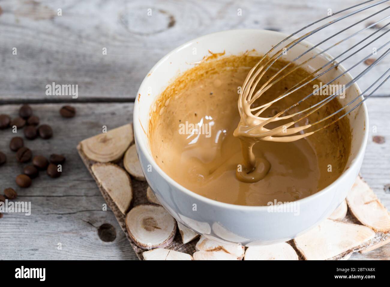 dalgona coffee making process, whipped instant coffee. cream coffee ...