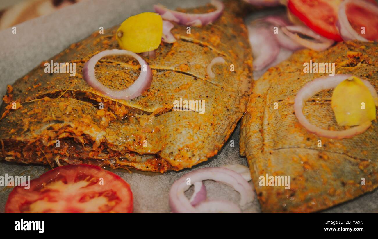 Black Pomfret with indian masala ready grill Stock Photo - Alamy