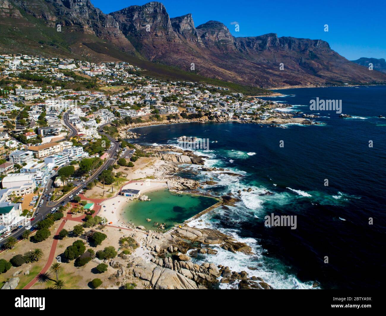 Aerial view of 12 Apostles along rocky cape peninsula coastline, Camps ...