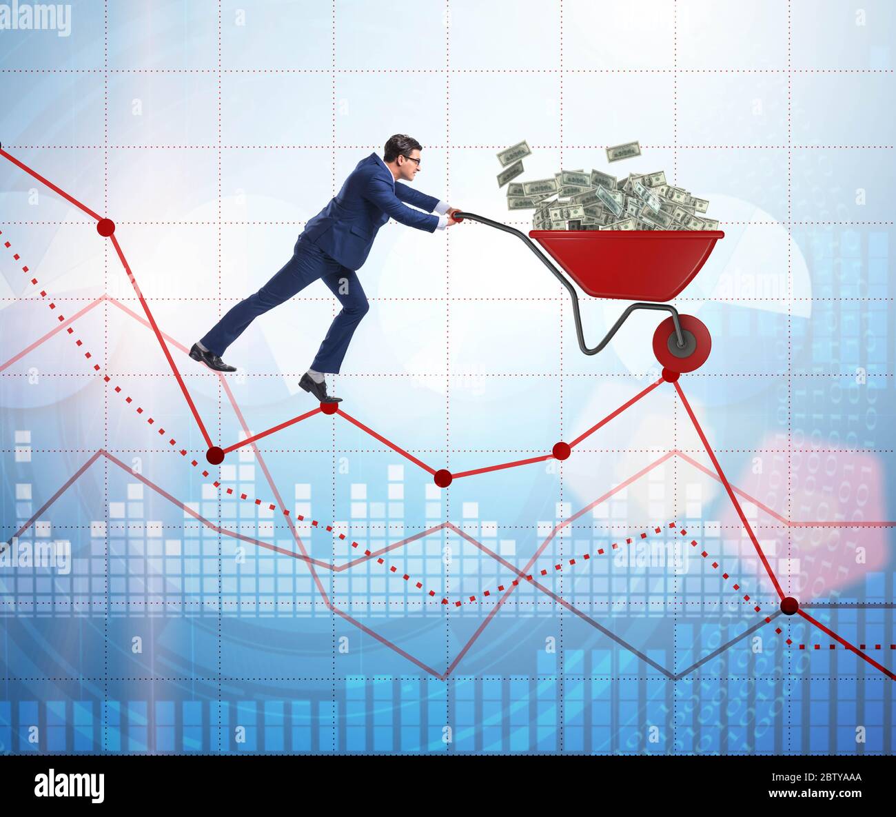 The businessman pushing money wheelbarrow down the chart Stock Photo ...