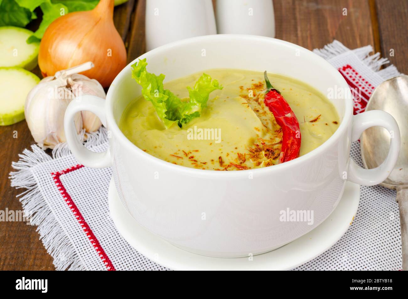 Spicy vegetarian vegetable puree soup green color, healthy eating ...