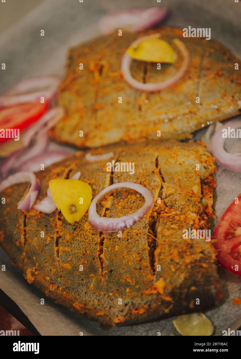 Black Pomfret with indian masala ready grill Stock Photo - Alamy