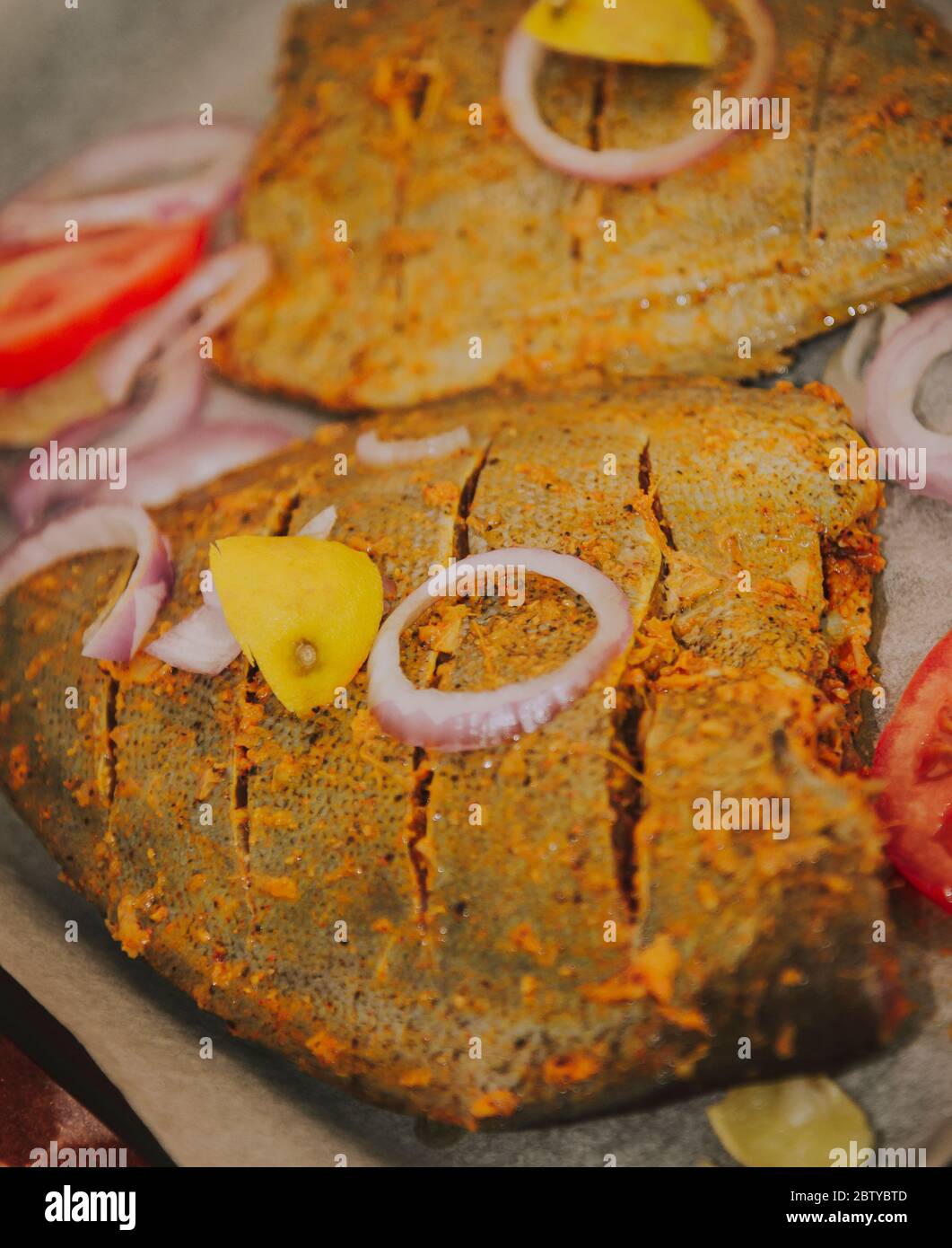 Black Pomfret with indian masala ready grill Stock Photo - Alamy