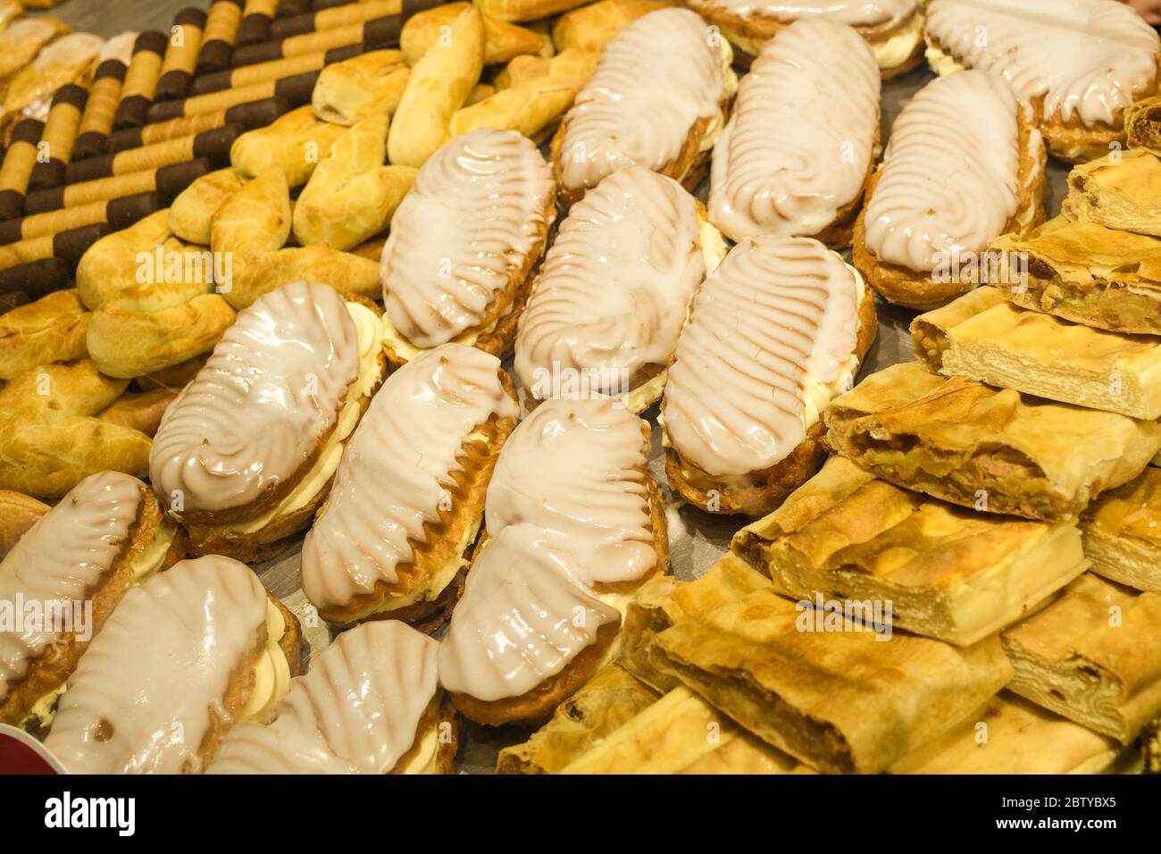 Display of traditional doughnuts on sale at Christmas market stall in ...