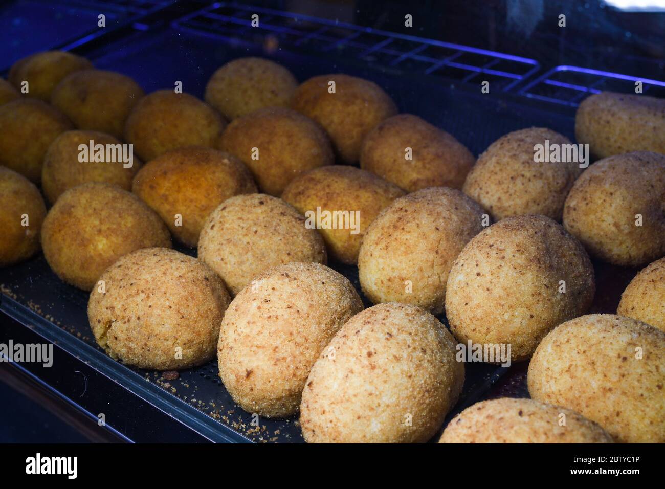 Arancini (deep fried rice balls with meat) Typical Sicilian street food ...