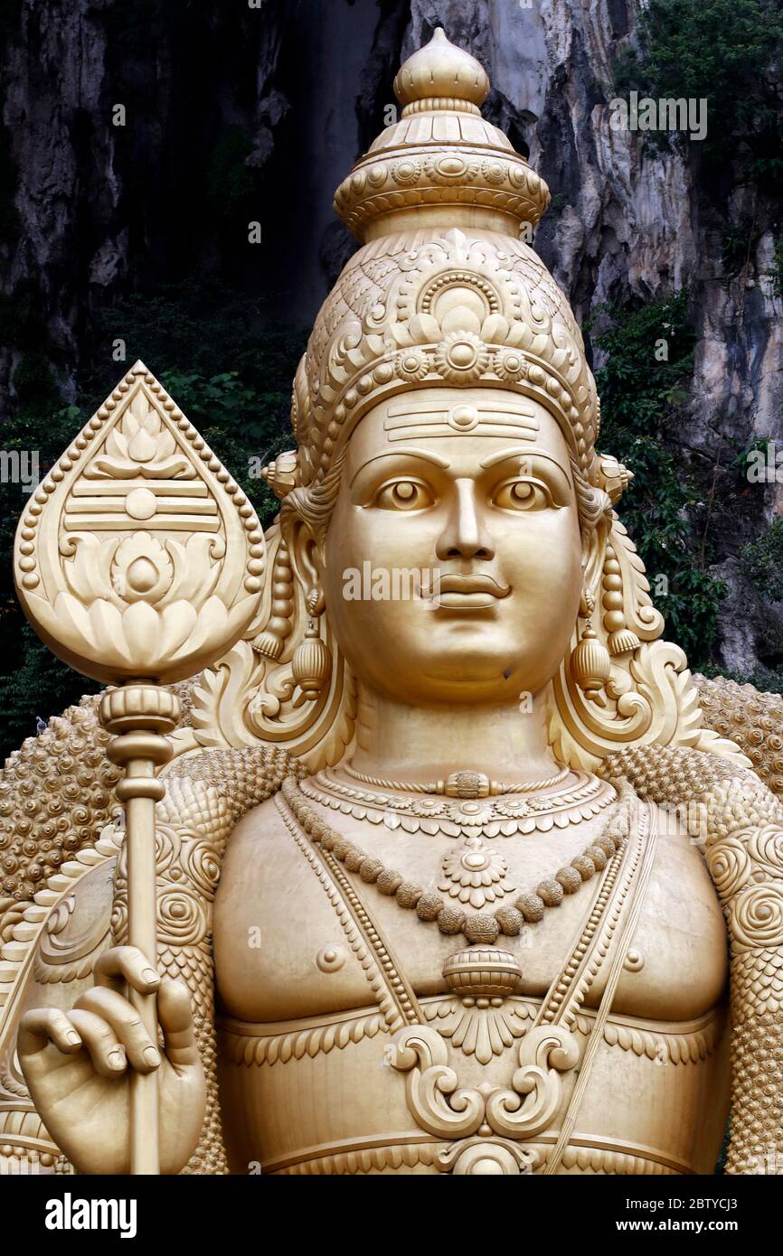 Entrance with the giant statue of Murugan, the Hindu God of War, Hindu ...