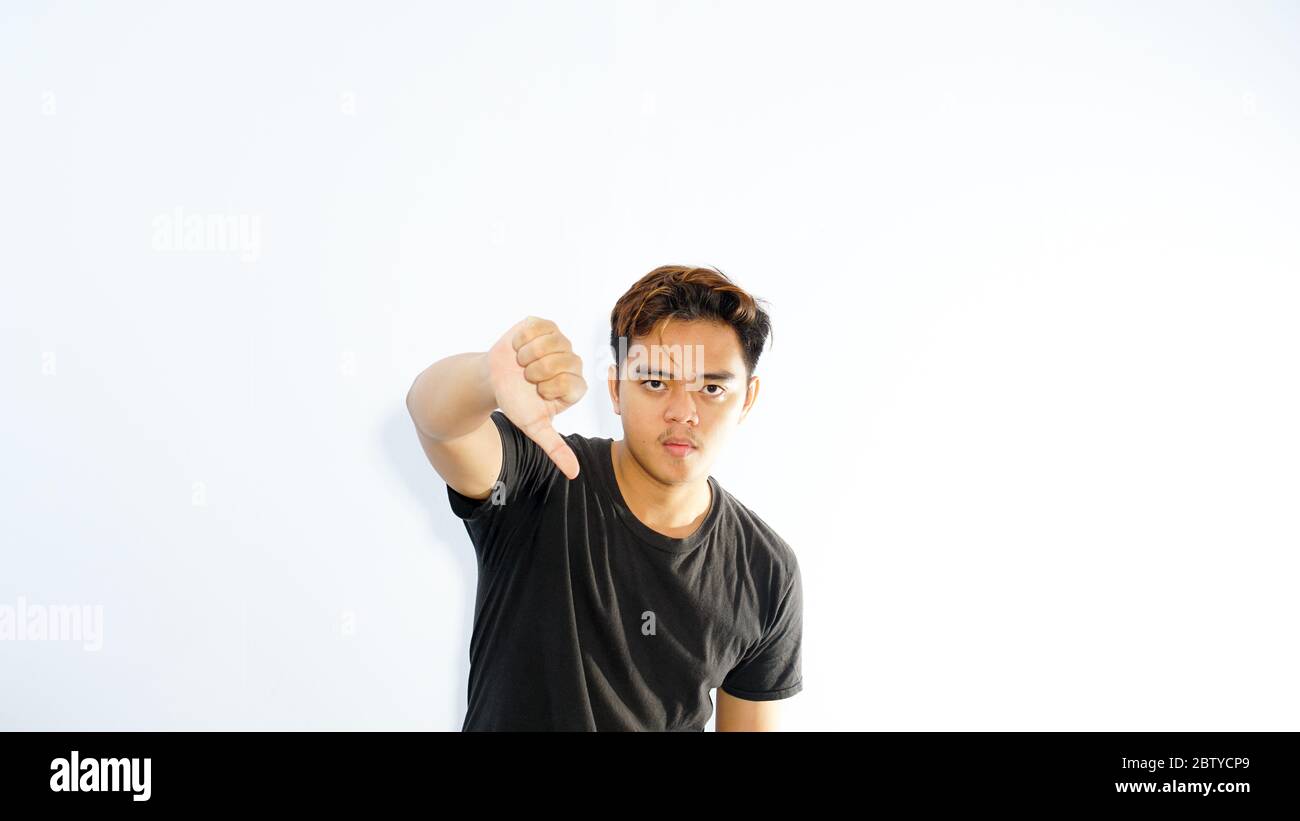 Young casual man thumb hi-res stock photography and images - Alamy
