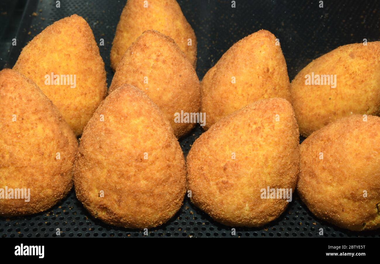 Arancini (deep fried rice balls with meat) Typical Sicilian street food ...