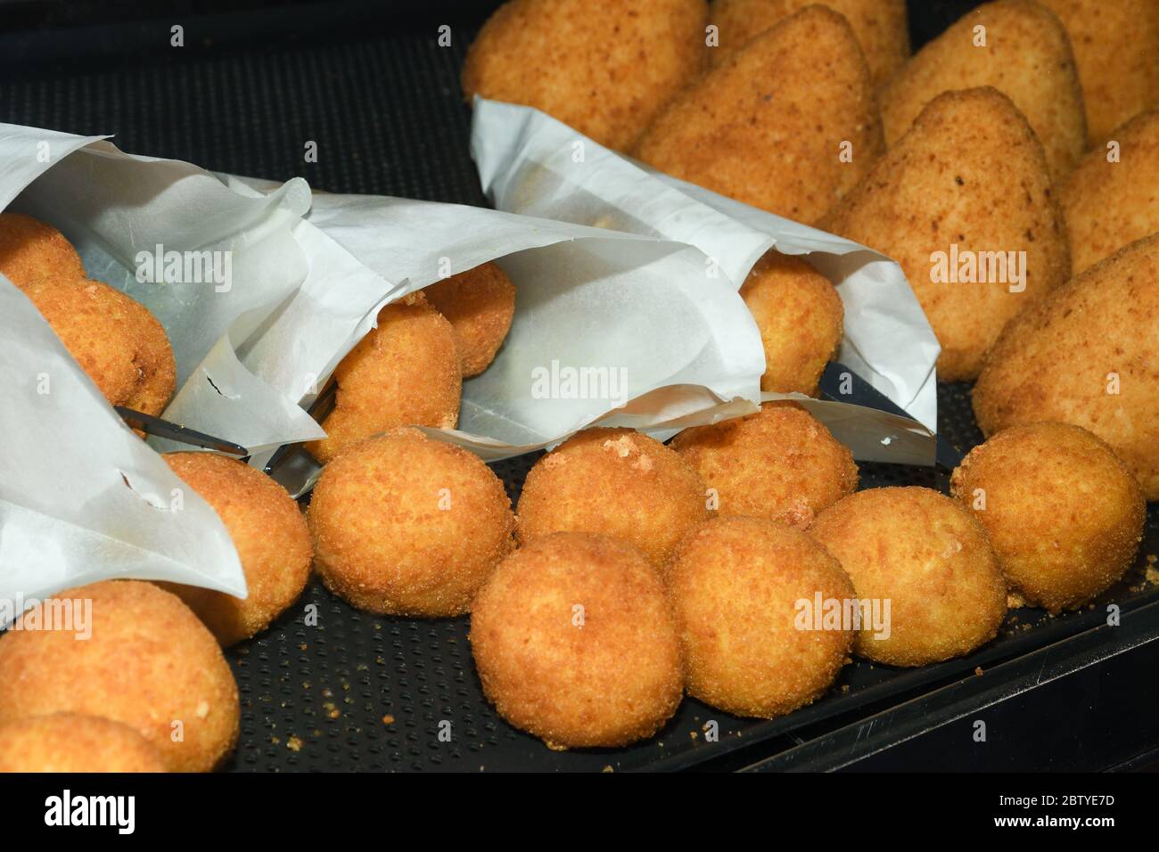 Arancini (deep fried rice balls with meat) Typical Sicilian street food ...