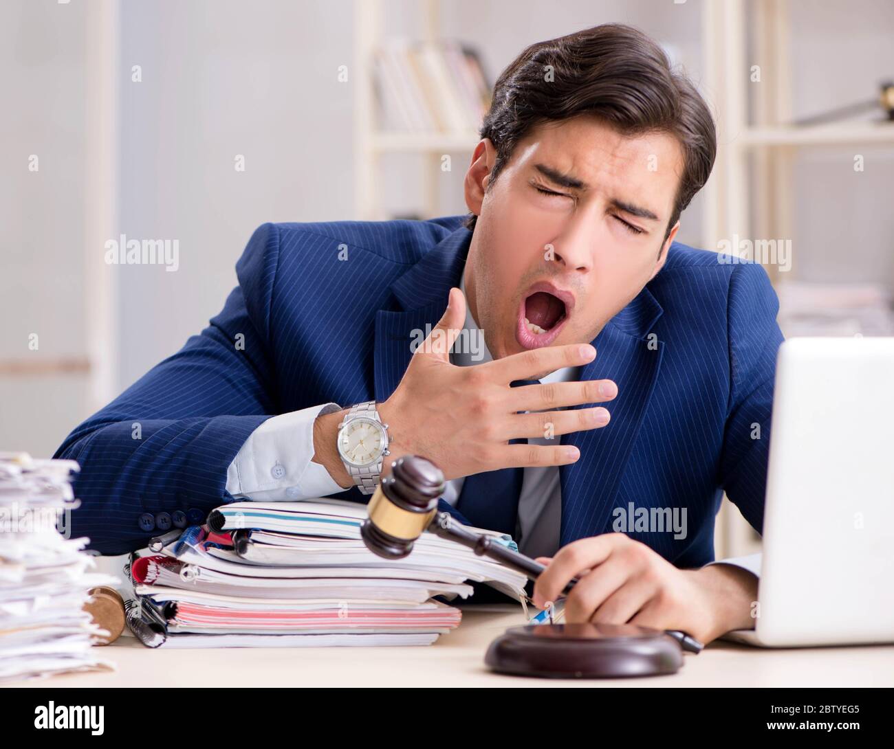 The young handsome judge working in court Stock Photo - Alamy