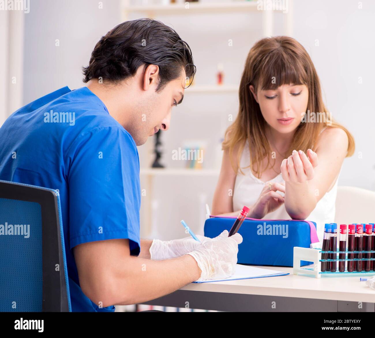 The young patient during blood test sampling procedure Stock Photo - Alamy