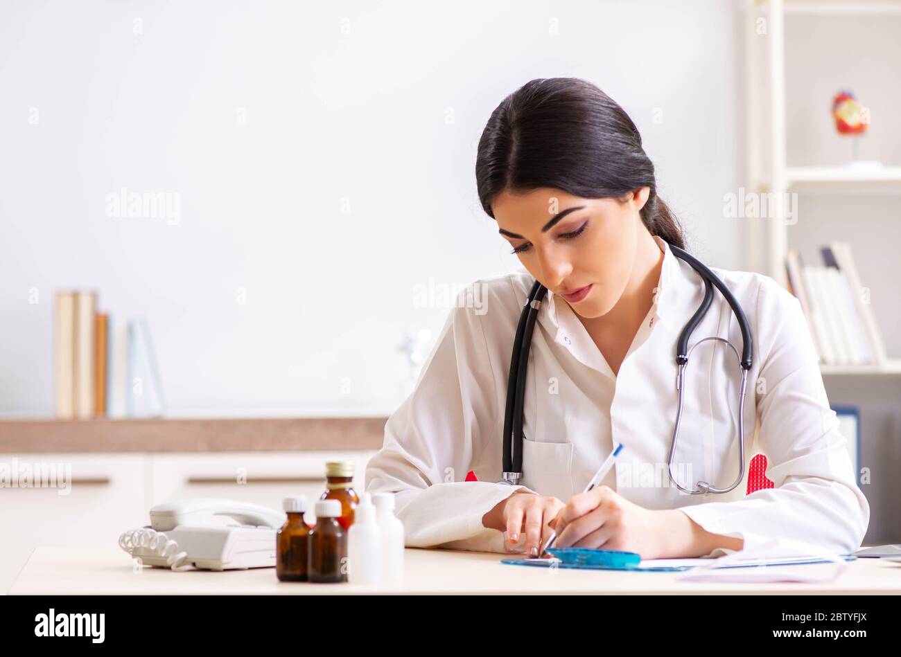 The woman doctor working in the hospital Stock Photo - Alamy
