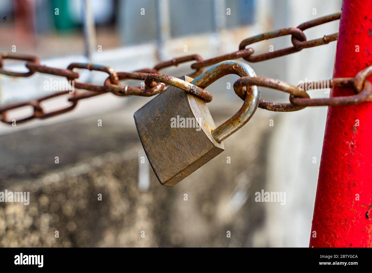 padlock and chain on the fence Stock Photo - Alamy