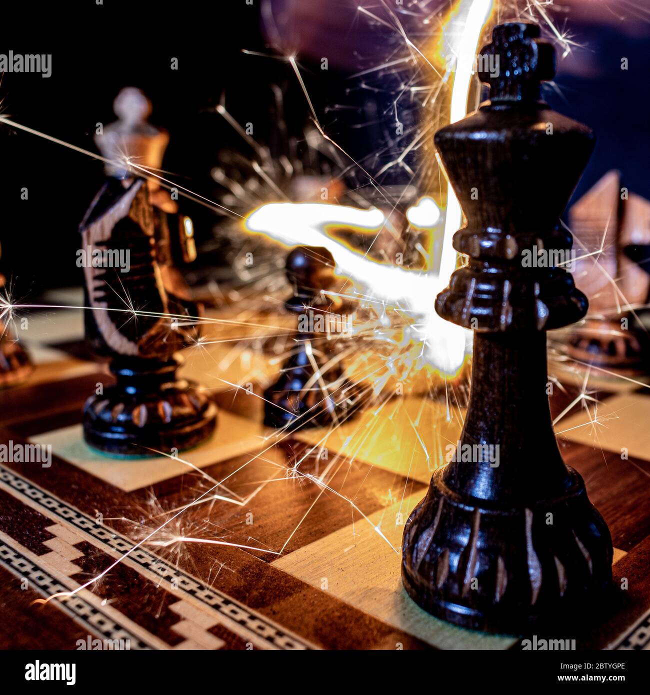 Chess Pieces with light trails and sparks Stock Photo - Alamy