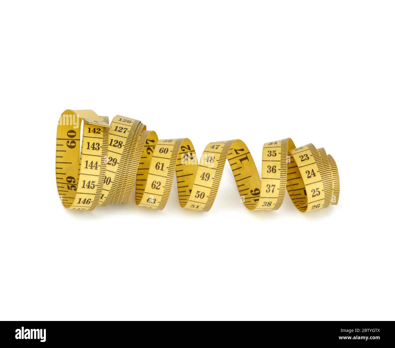 twisted yellow measuring tape isolated on white background, close up ...