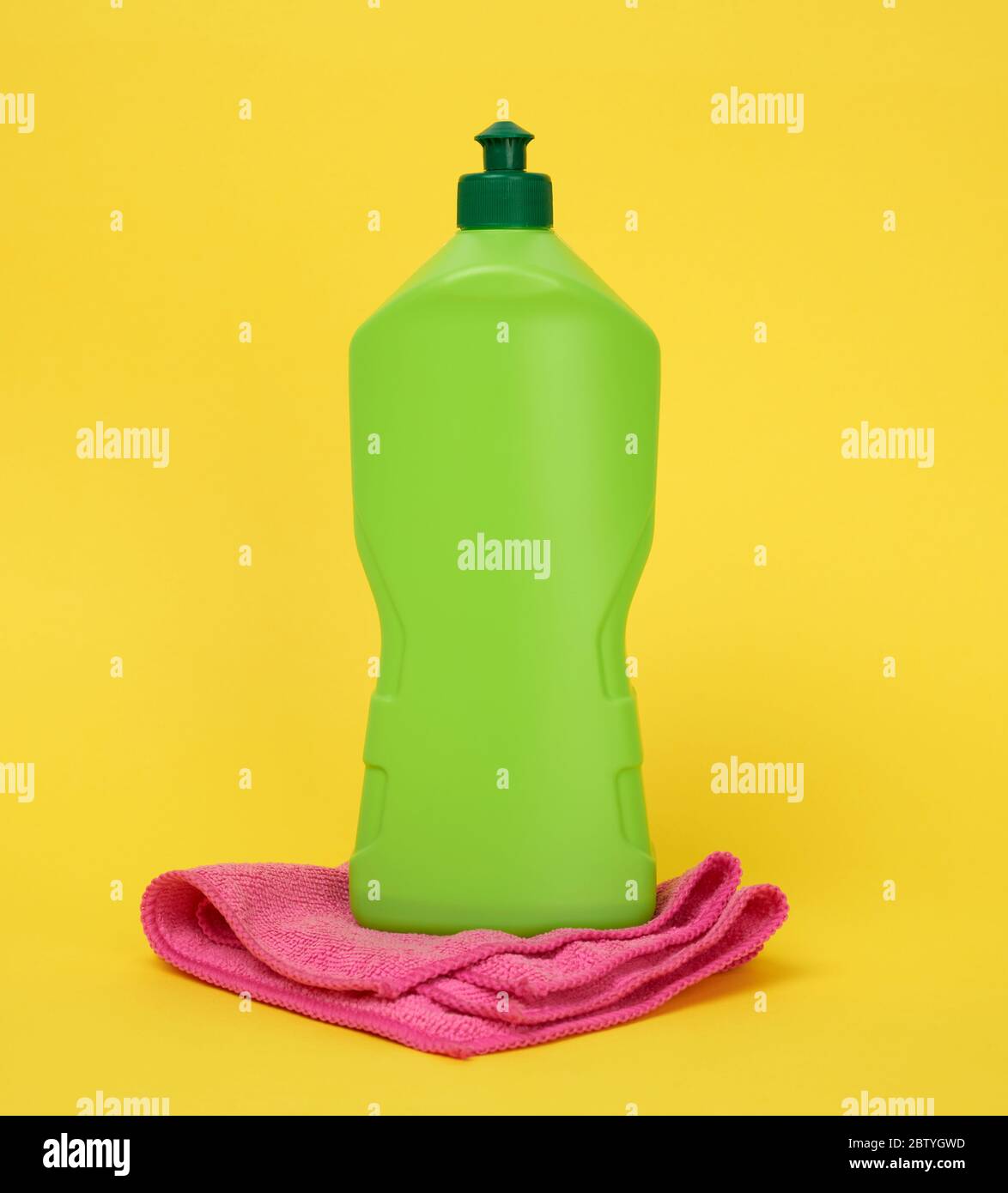 pink kitchen rectangular dishwashing sponges and green plastic bottle ...