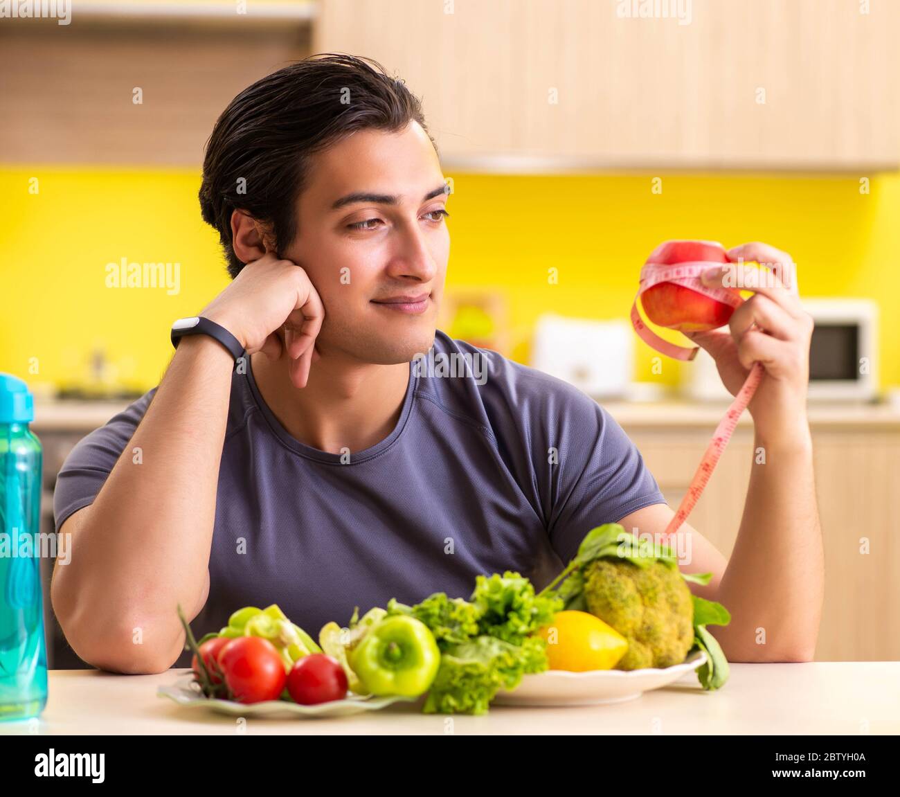 The young man in dieting and healthy eating concept Stock Photo - Alamy