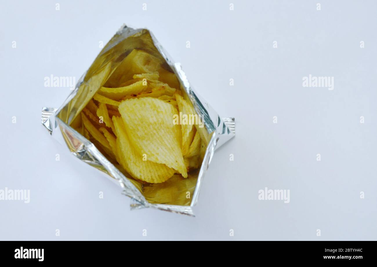 potato chip in aluminium foil packaging on white background Stock Photo ...