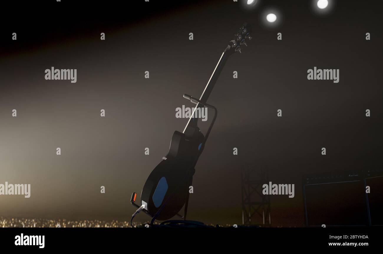 An electric guitar resting on a stand on a music concert stage lit by a ...